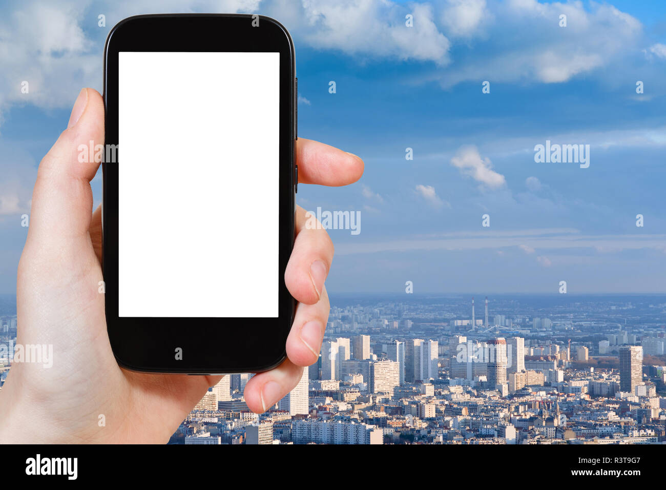 smartphone with cut out screen and Paris panorama Stock Photo - Alamy
