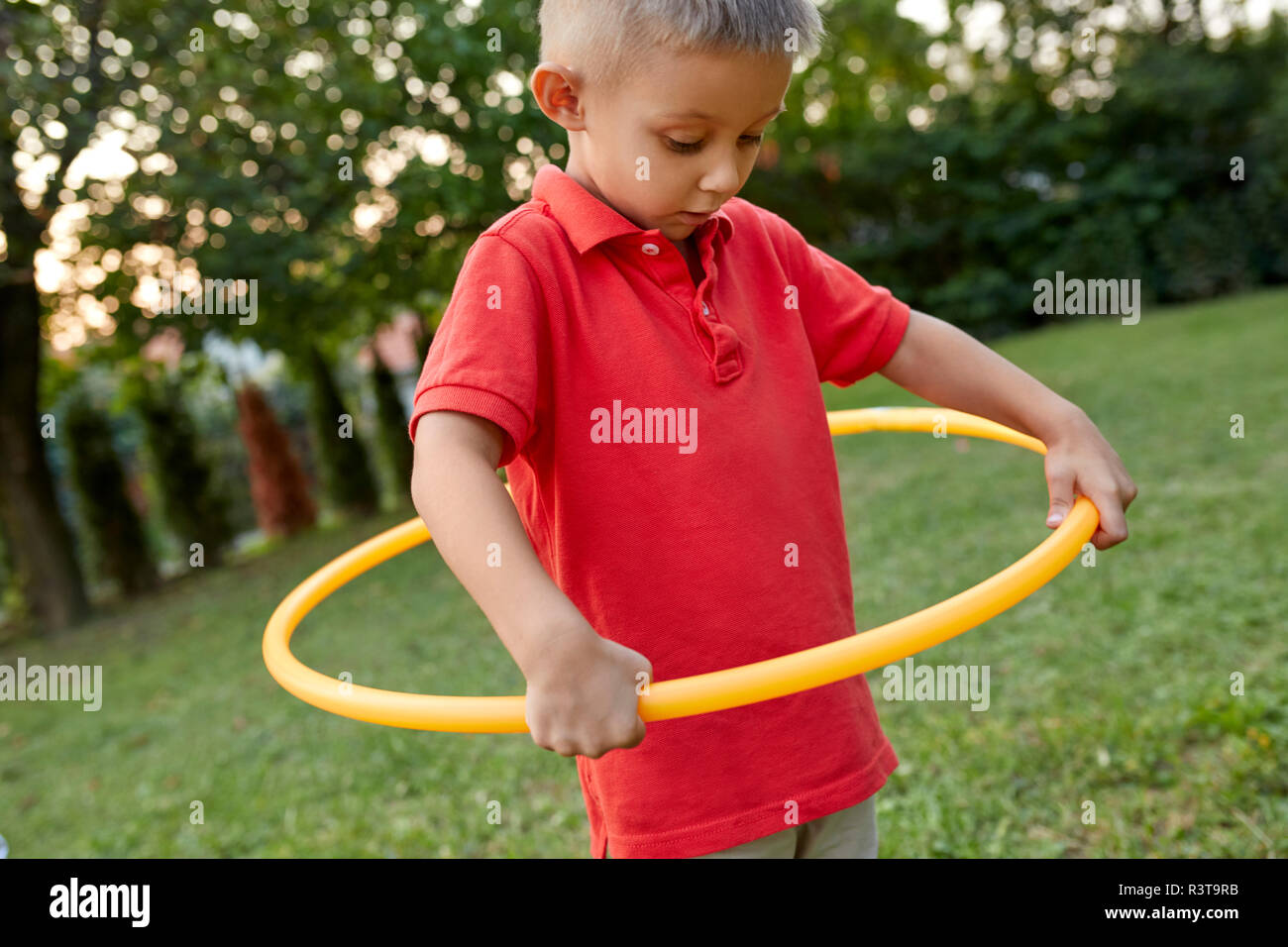 Children playing hula hoops hi-res stock photography and images - Alamy