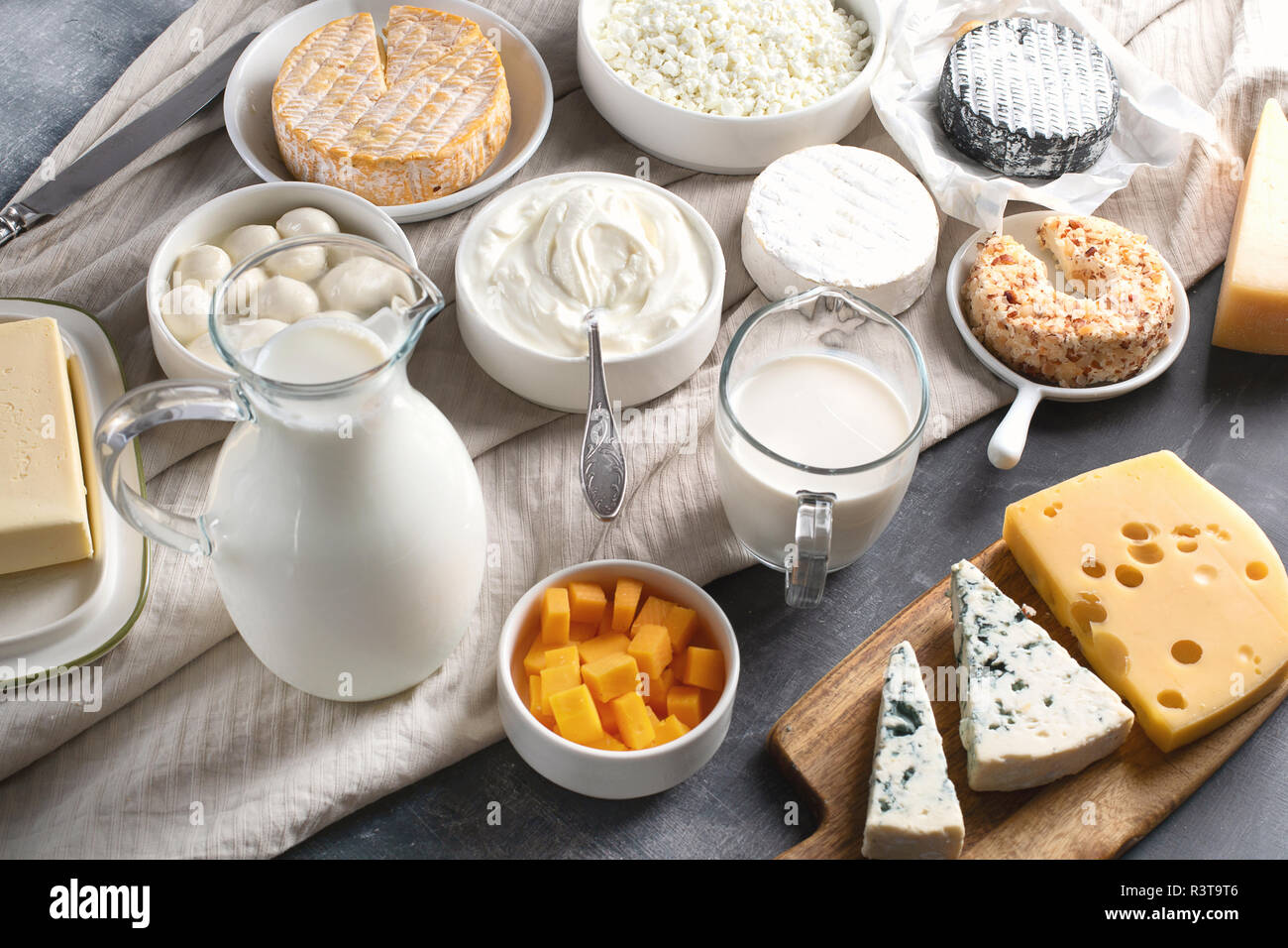 Dairy products. Milk, cheese, sour cream, cottage, yogurt and butter on ...
