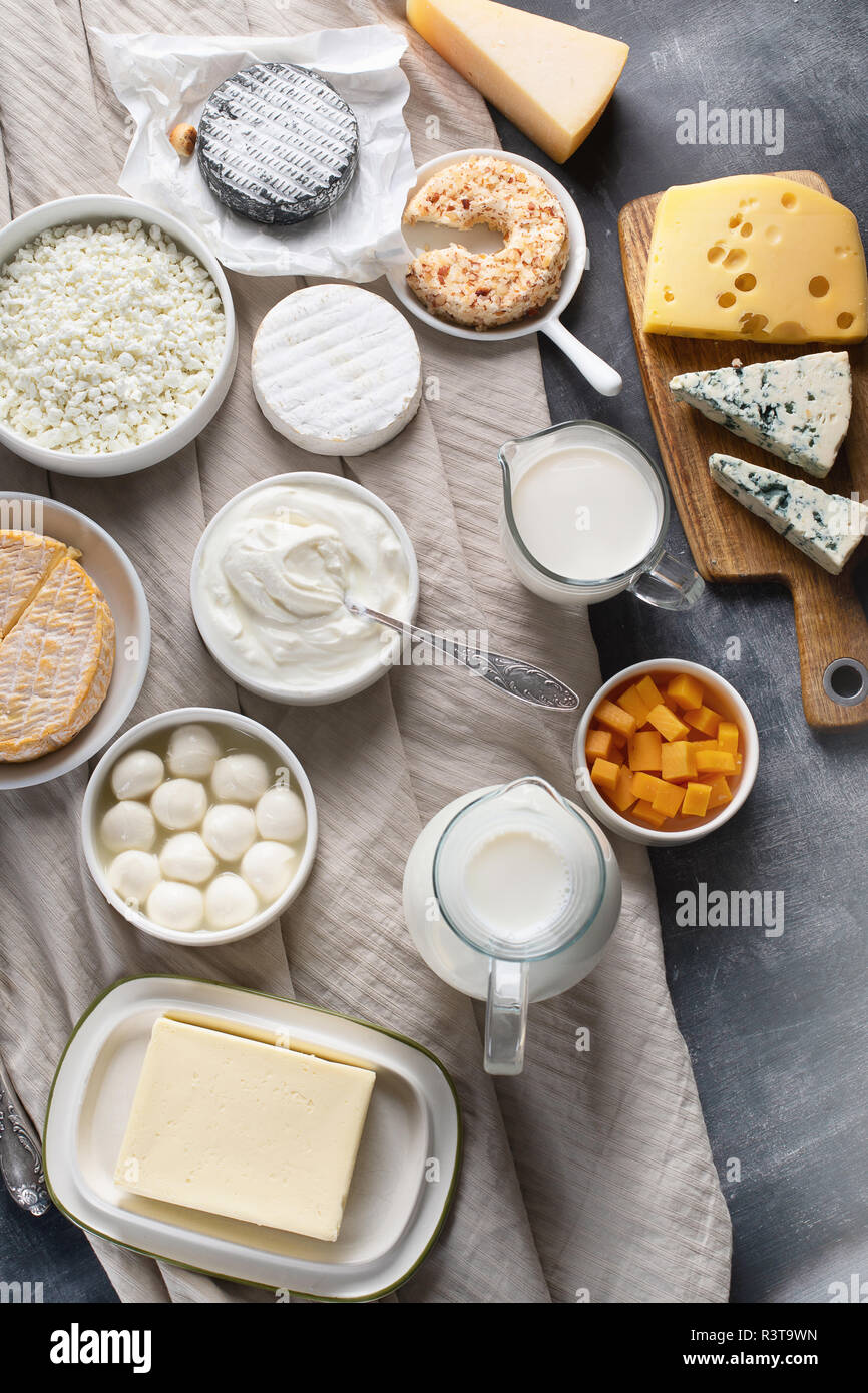 Dairy products. Milk, cheese, sour cream, cottage, yogurt and butter on ...