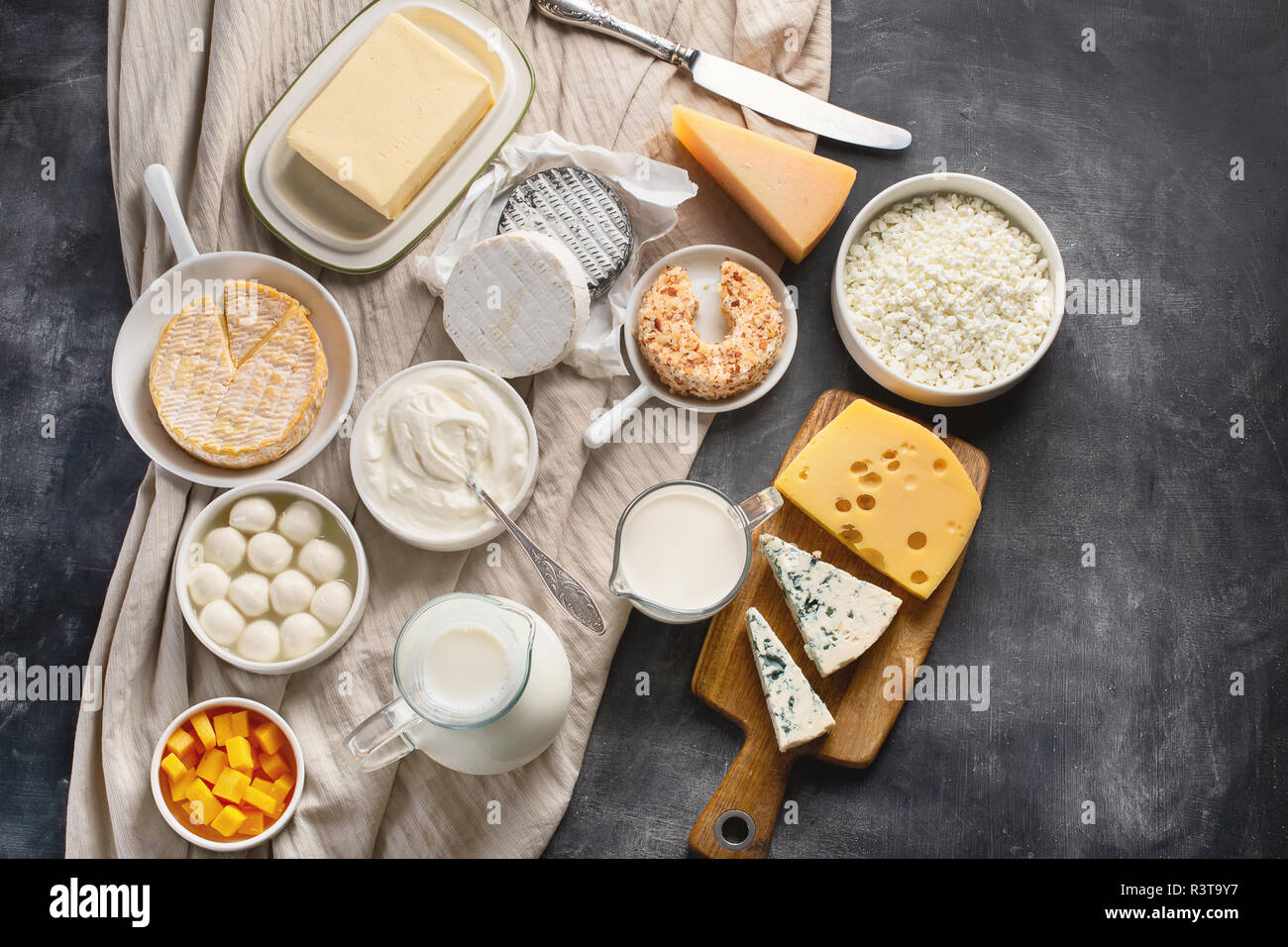 Dairy products. Milk, cheese, sour cream, cottage, yogurt and butter on ...