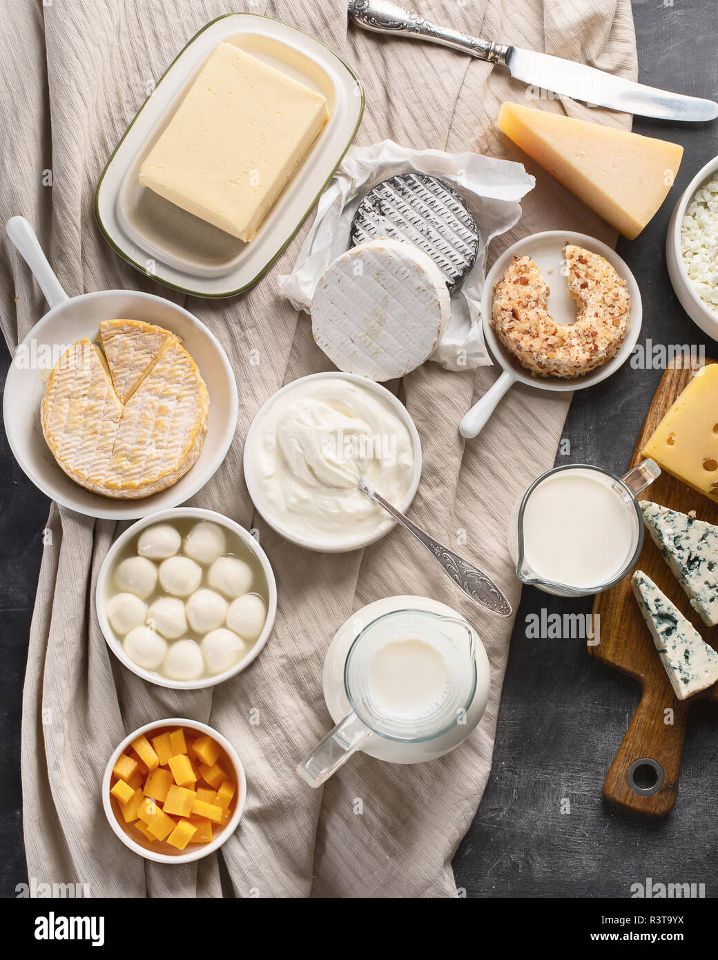 Dairy products. Milk, cheese, sour cream, cottage, yogurt and butter on ...