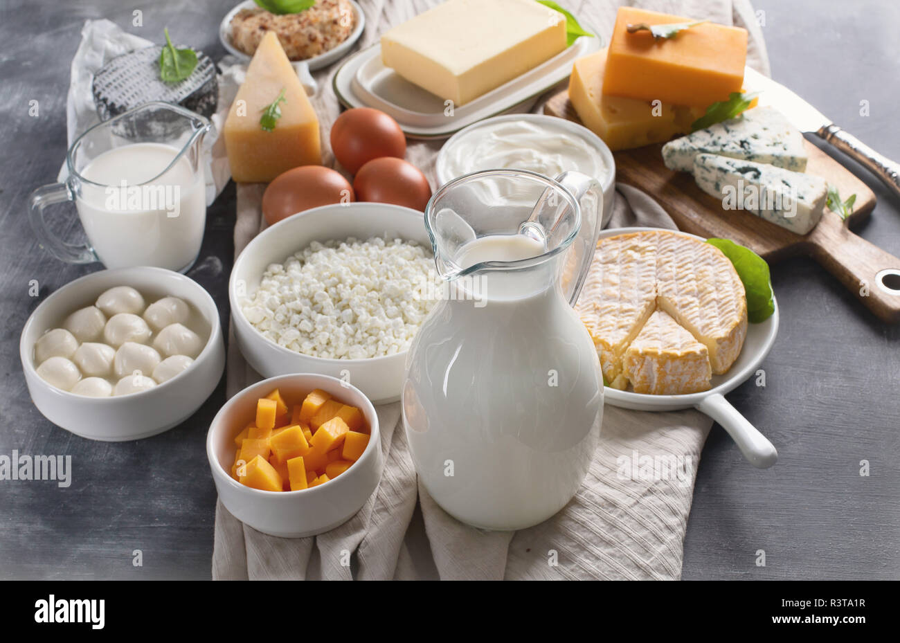 Dairy products. Milk, cheese, sour cream, cottage, yogurt and butter on ...
