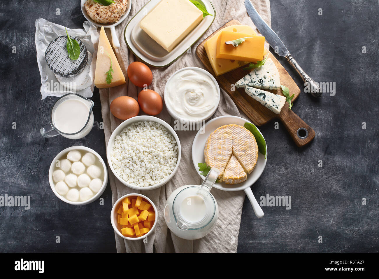 Dairy products. Milk, cheese, sour cream, cottage, yogurt and butter on ...