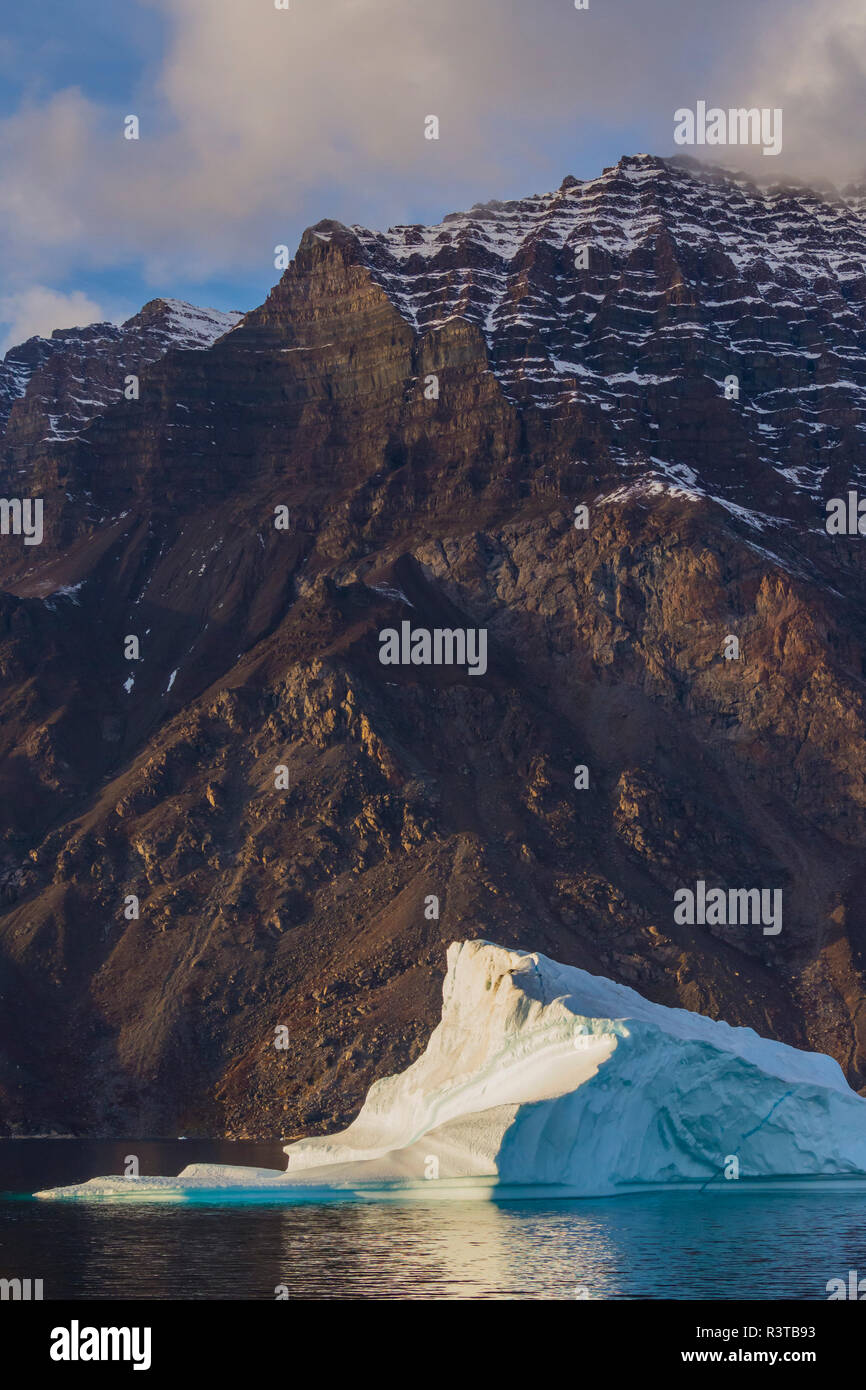 Greenland. Scoresby Sund. Milne Land. Small icebergs and rocky ...