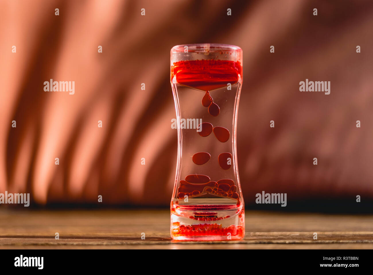 Red drops similar to blood falling in water Stock Photo - Alamy