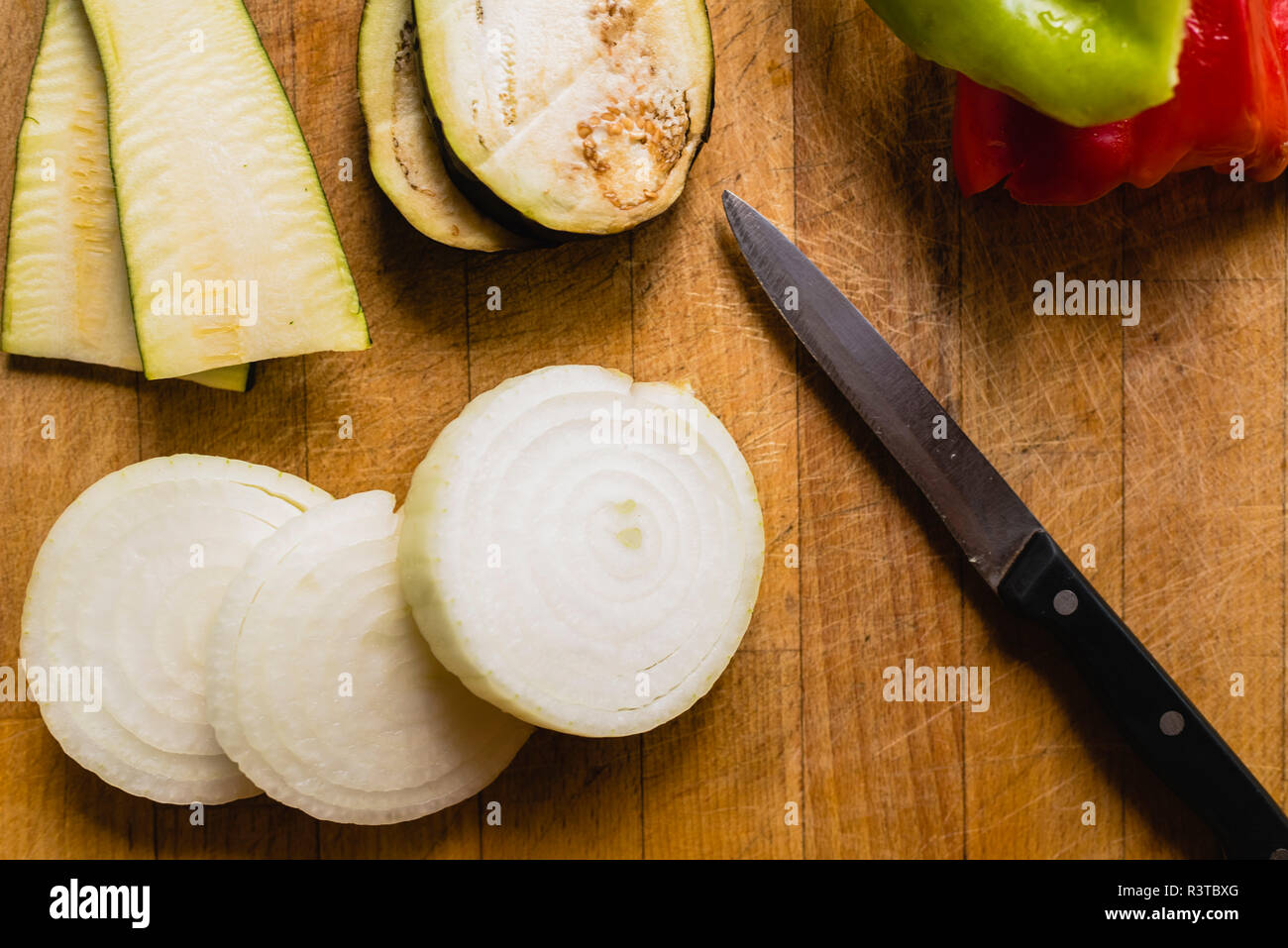 Fresh vegetables cut with knife in the kitchen Stock Photo - Alamy