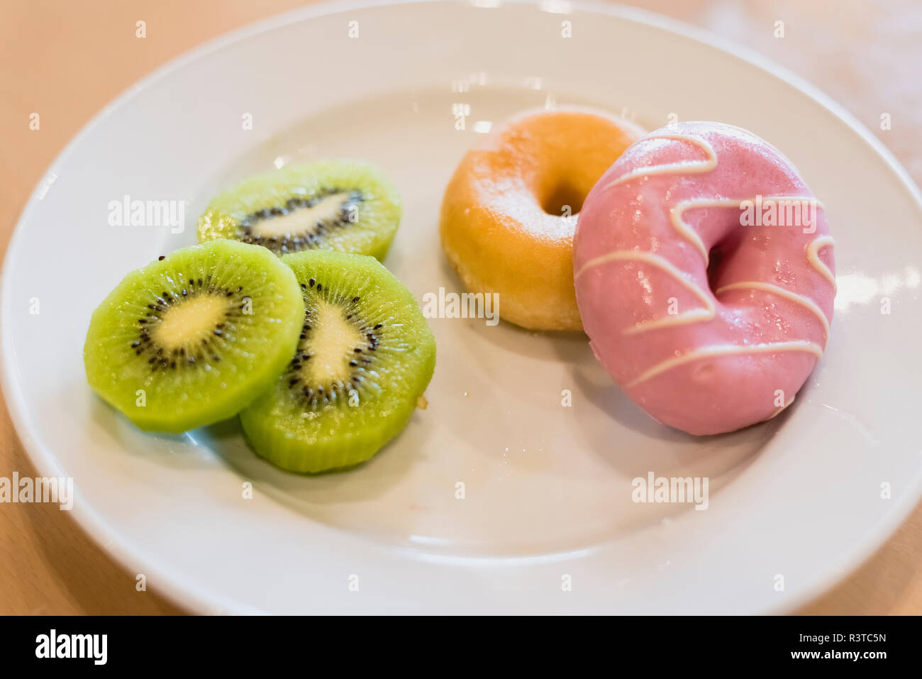 Concept of a difficult decision, healthy eating or sweets Stock Photo ...