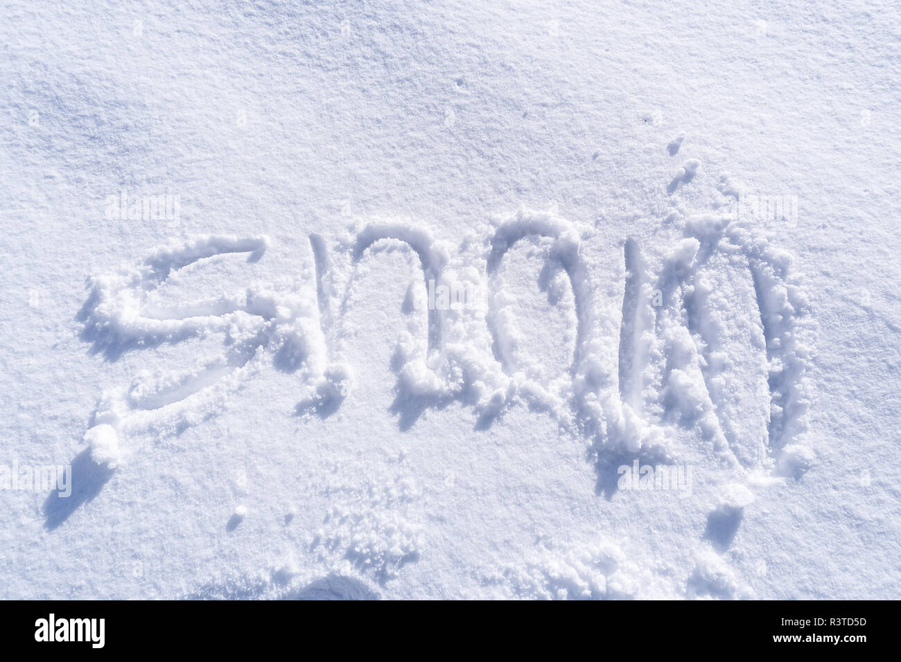 Handwriting of Snow text on snow for background Stock Photo - Alamy