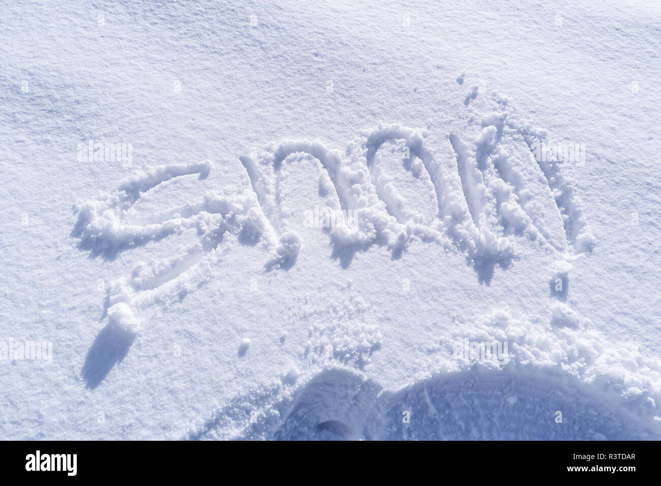 Handwriting of Snow text on snow for background Stock Photo - Alamy