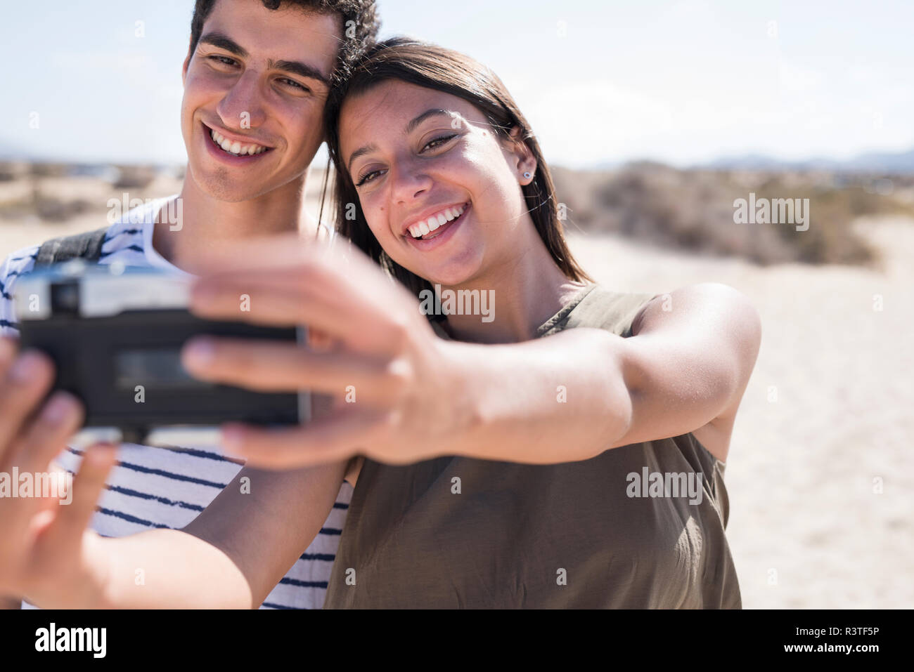 Two couples on beach having hi-res stock photography and images - Alamy