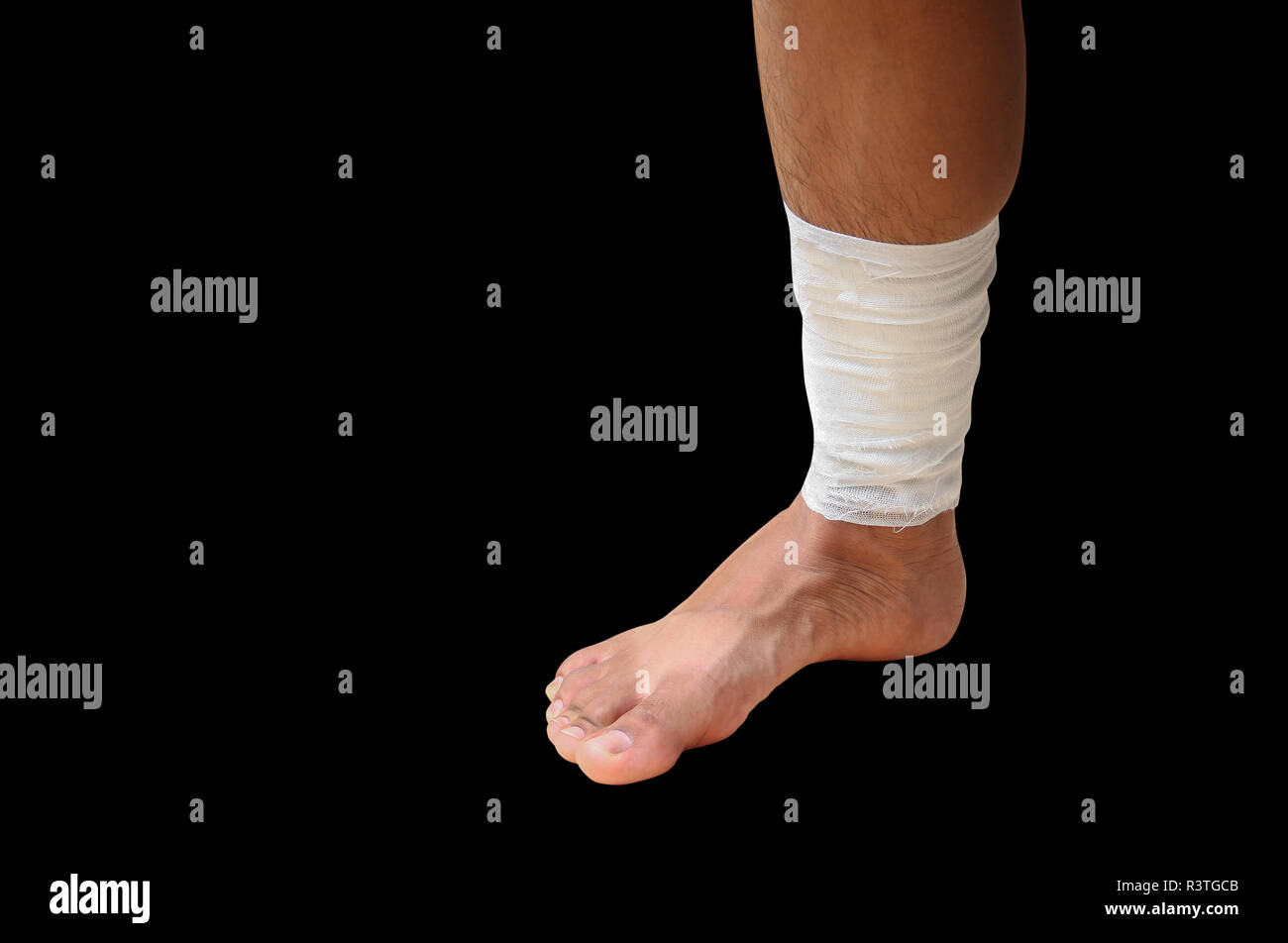 leg an injured with bandage isolated on black background and clipping ...