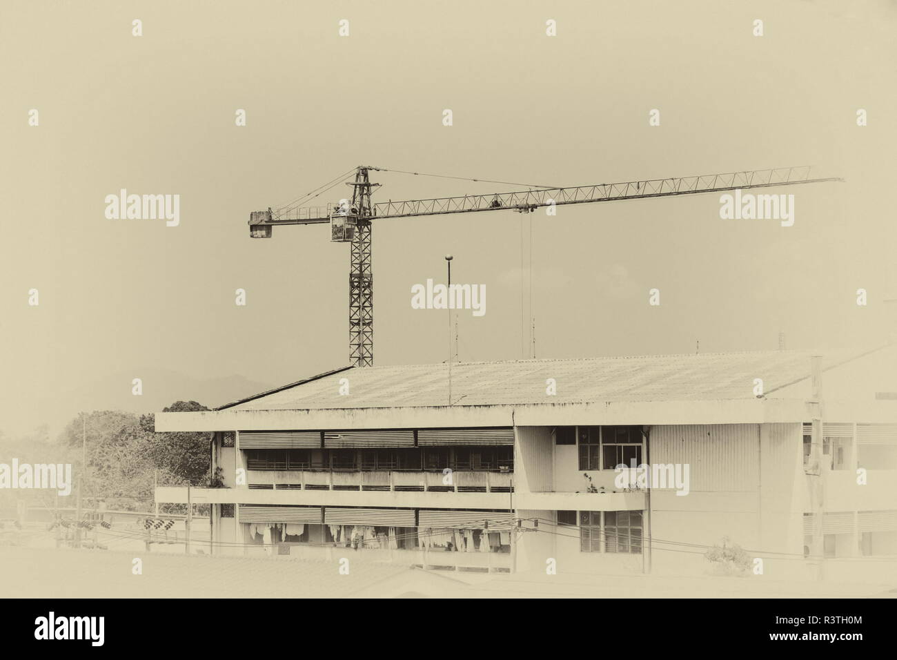 crane in construction building site. vintage tone image Stock Photo - Alamy