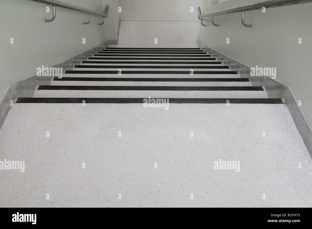terrazzo floor stairs walkway down. select focus with shallow depth of ...