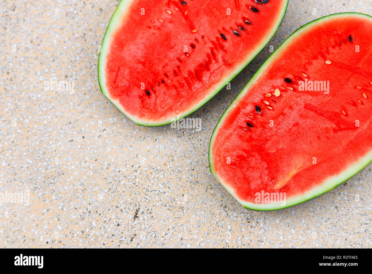 watermelon red fresh half on polished stone table select focus with ...
