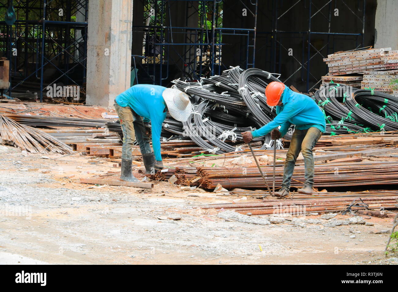 construction two workers wrought iron Stock Photo - Alamy