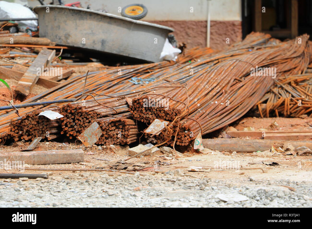 steel bar, iron in a construction site is rust on the ground select ...