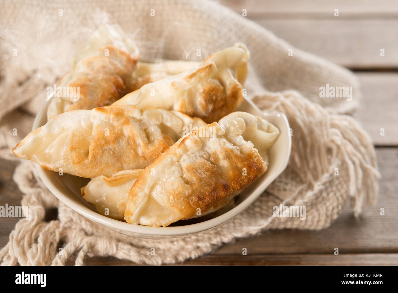 Famous Asian food pan fried dumplings Stock Photo - Alamy