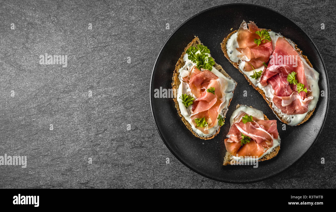 Sliced prosciutto rosemary bread hi-res stock photography and images ...