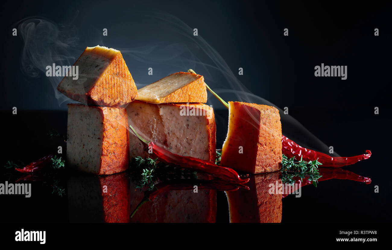 Red Pecorino sheep milk cheese with thyme and red pepper. Traditional ...