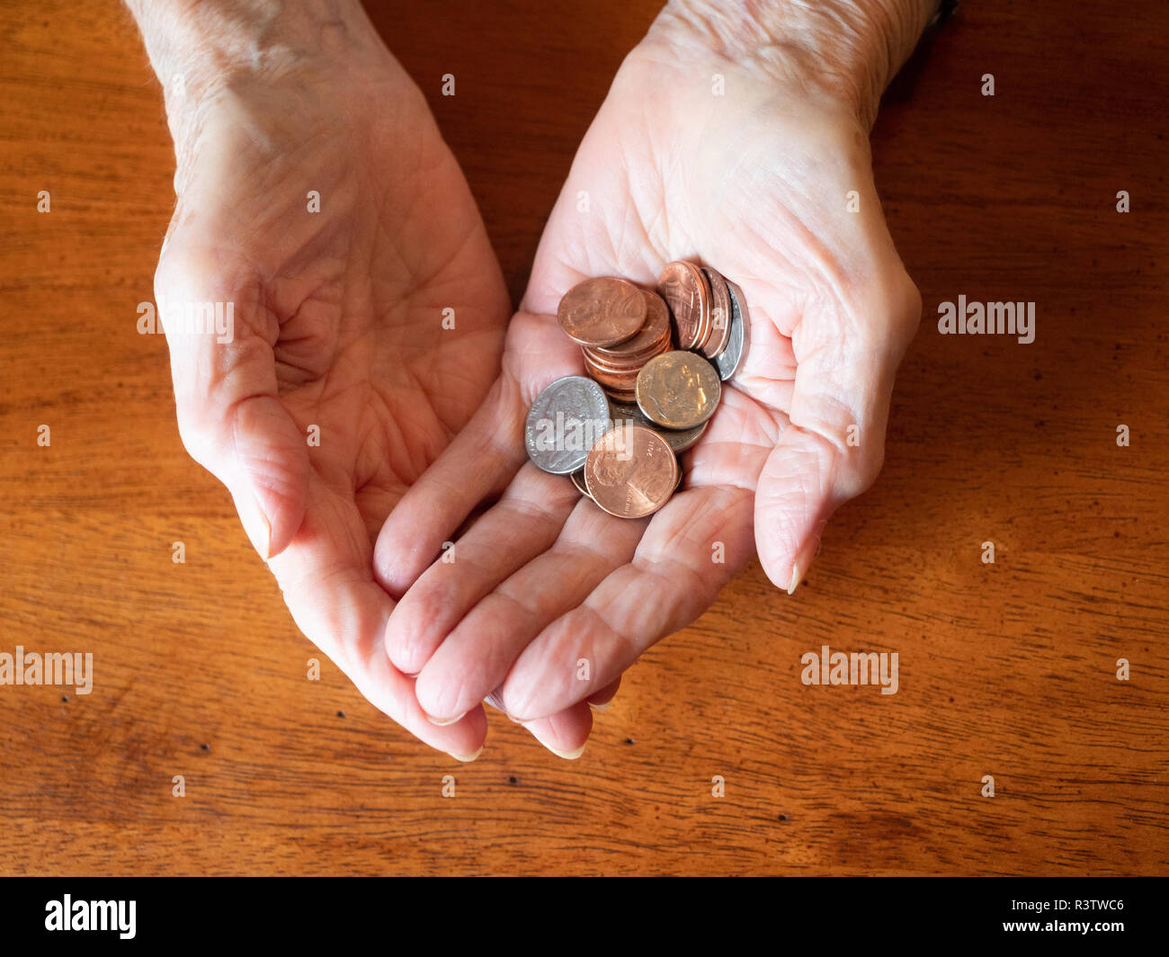 Money pinching hi-res stock photography and images - Alamy
