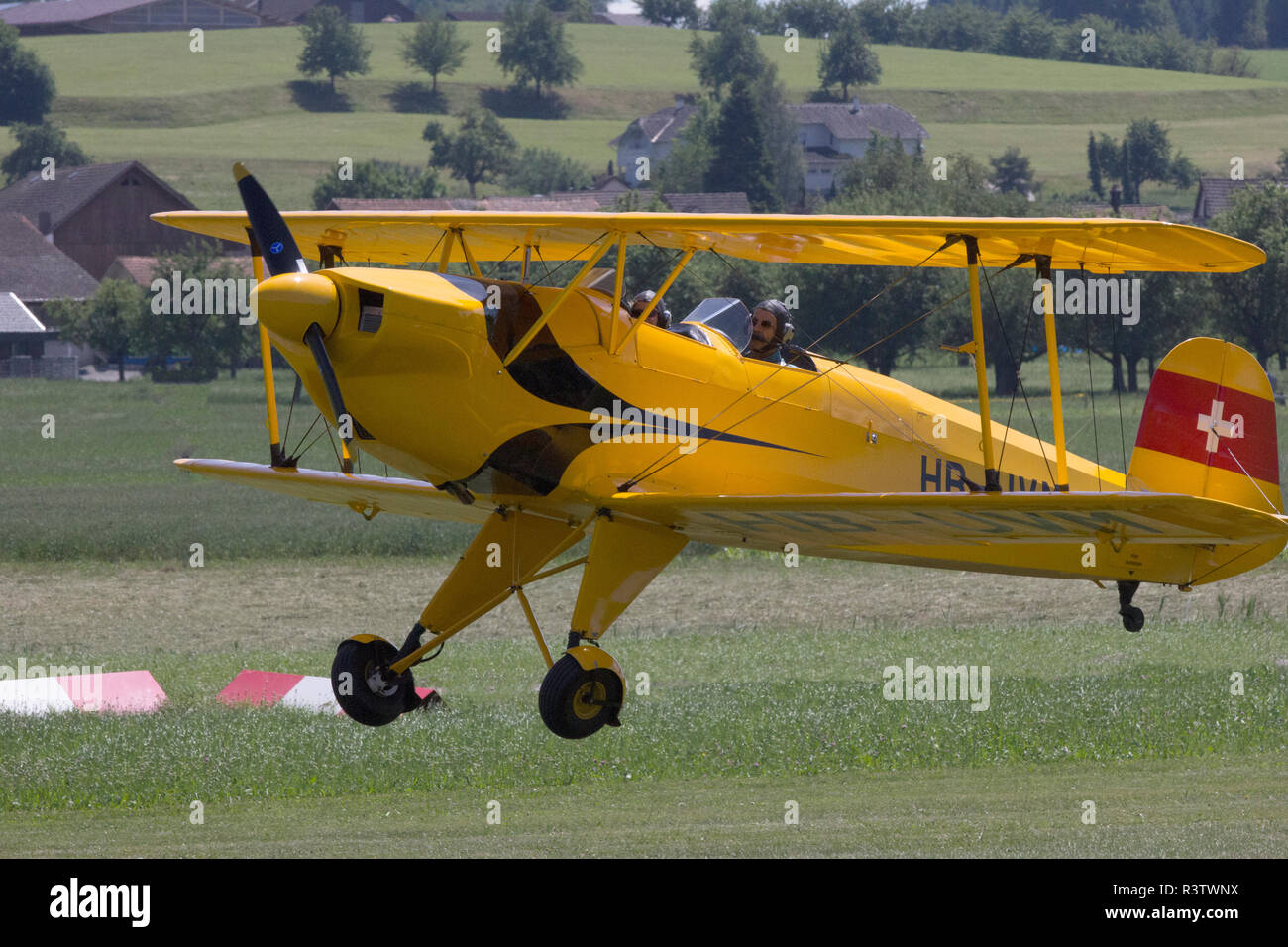 Yellow biplane hi-res stock photography and images - Alamy