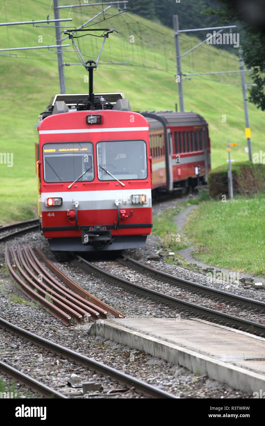 Local Swiss train departing small village in Appenzell, Switzerland ...