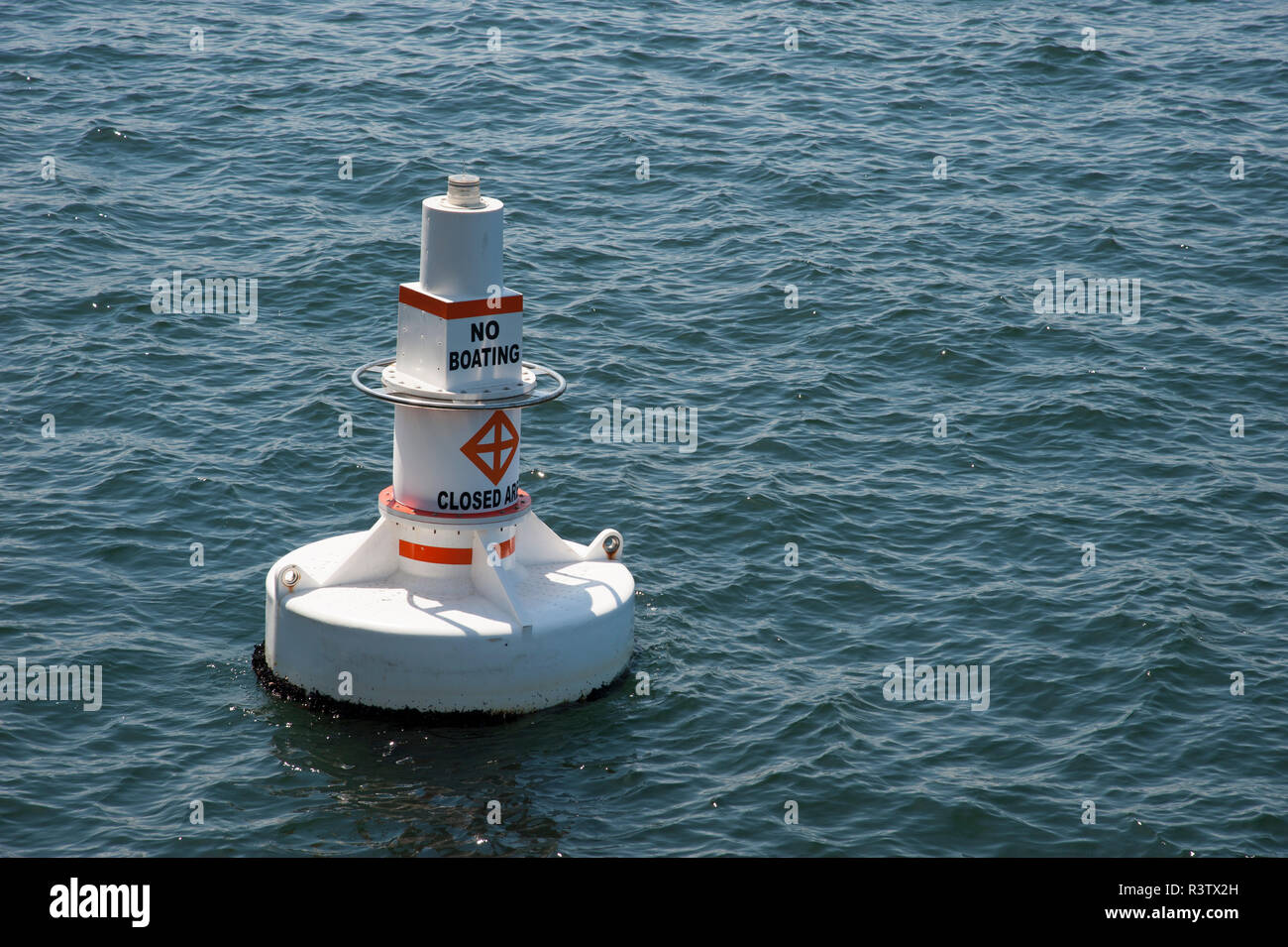Floating white buoy in the sea Stock Photo - Alamy