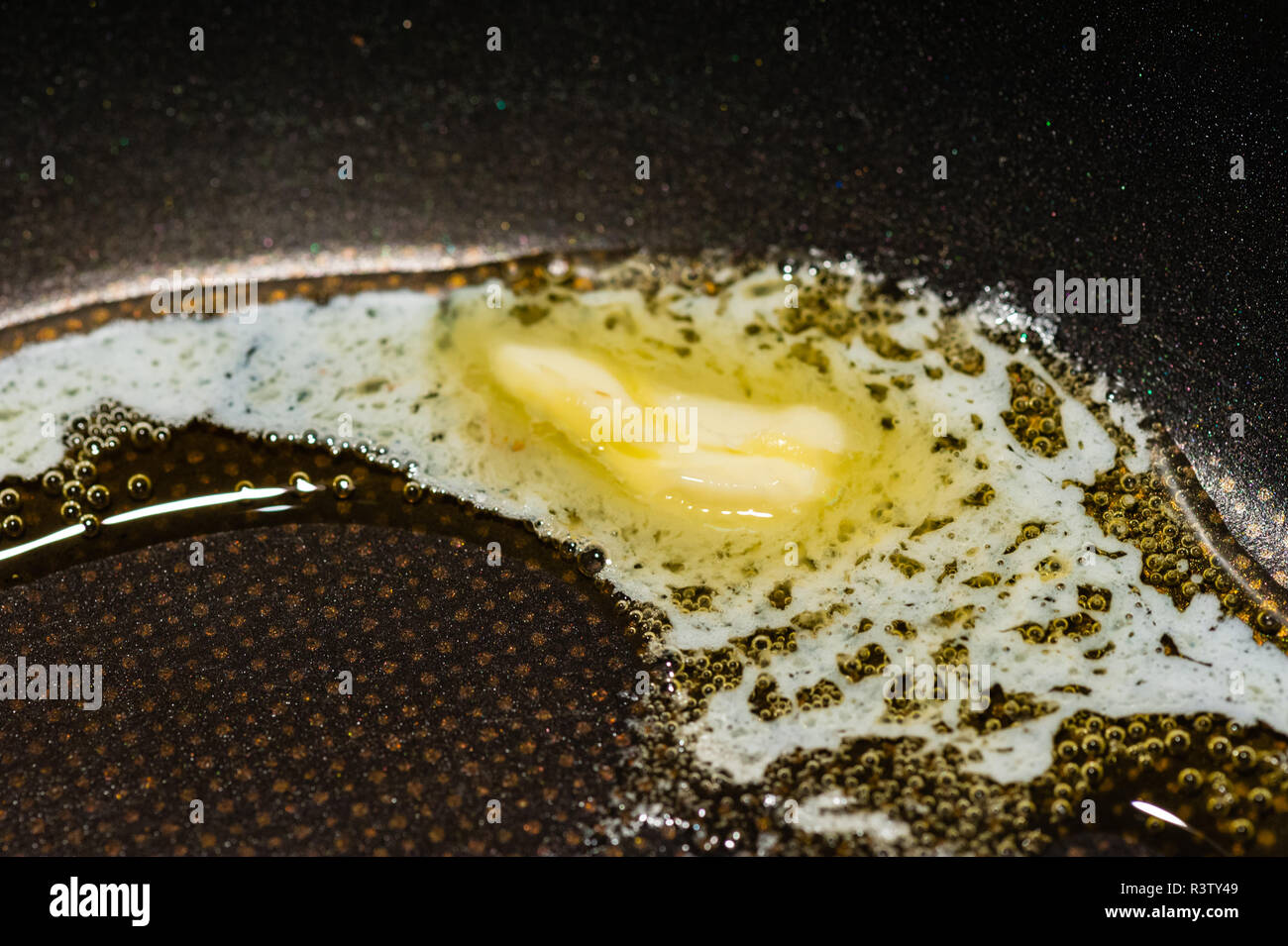 Butter melting in hot skillet hi-res stock photography and images - Alamy