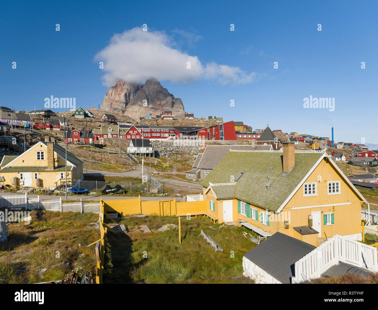 Small town of Uummannaq in northwest Greenland. Old house in typical ...