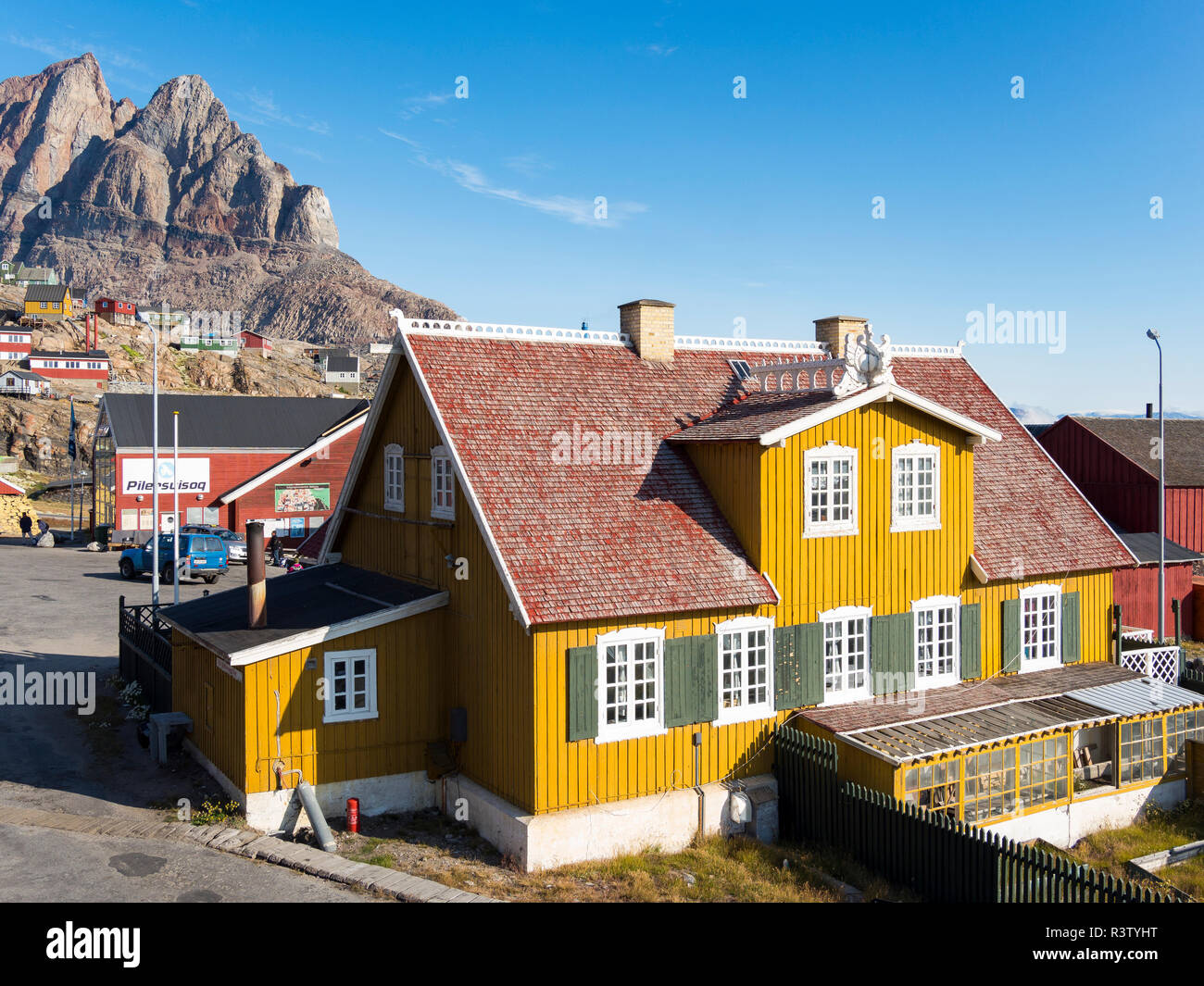 Small town of Uummannaq in northwest Greenland. Old house in typical ...