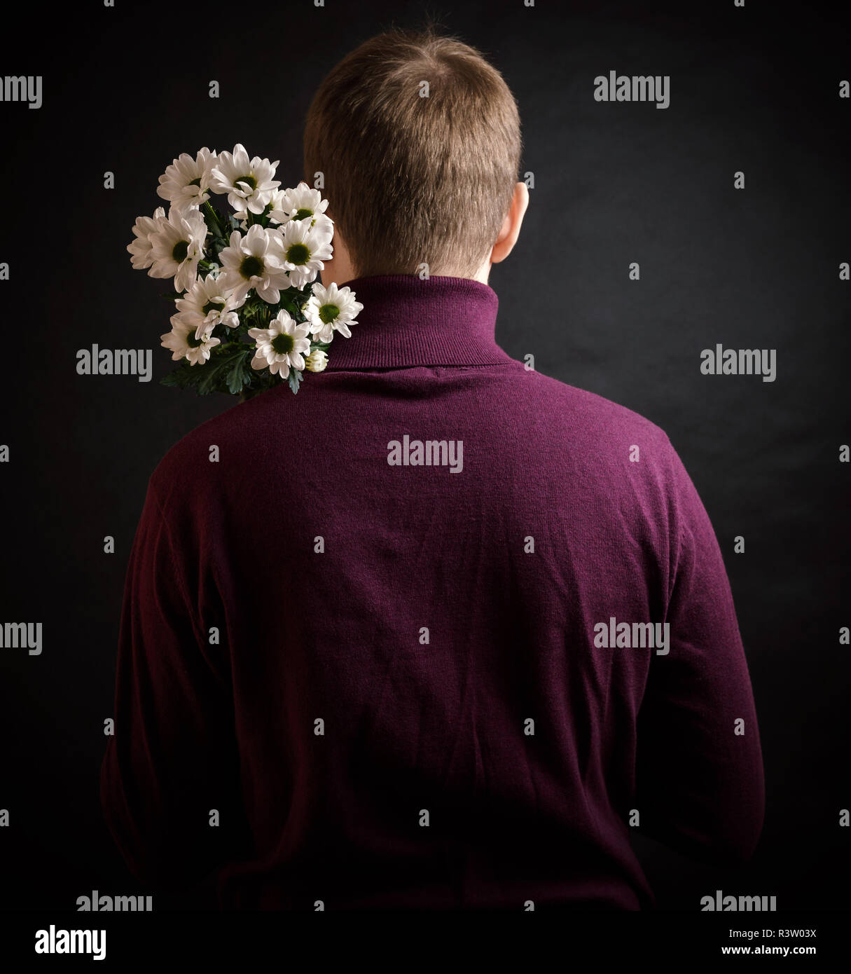 Holding flowers behind back hi-res stock photography and images - Alamy