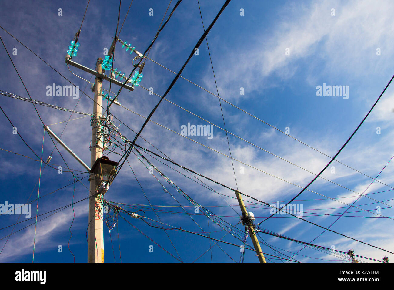 row of wire pole Stock Photo - Alamy