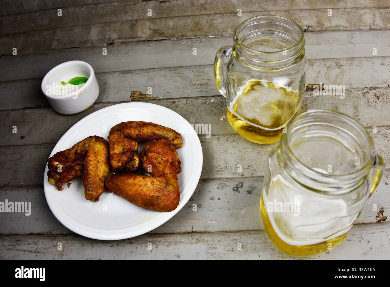 Beer with Chicken Stock Photo - Alamy