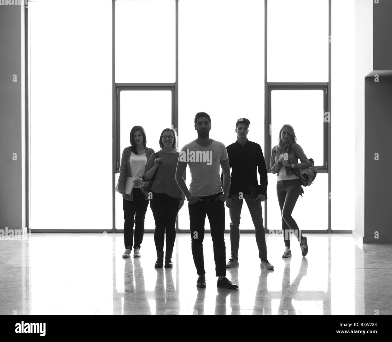 students group standing together as team Stock Photo - Alamy