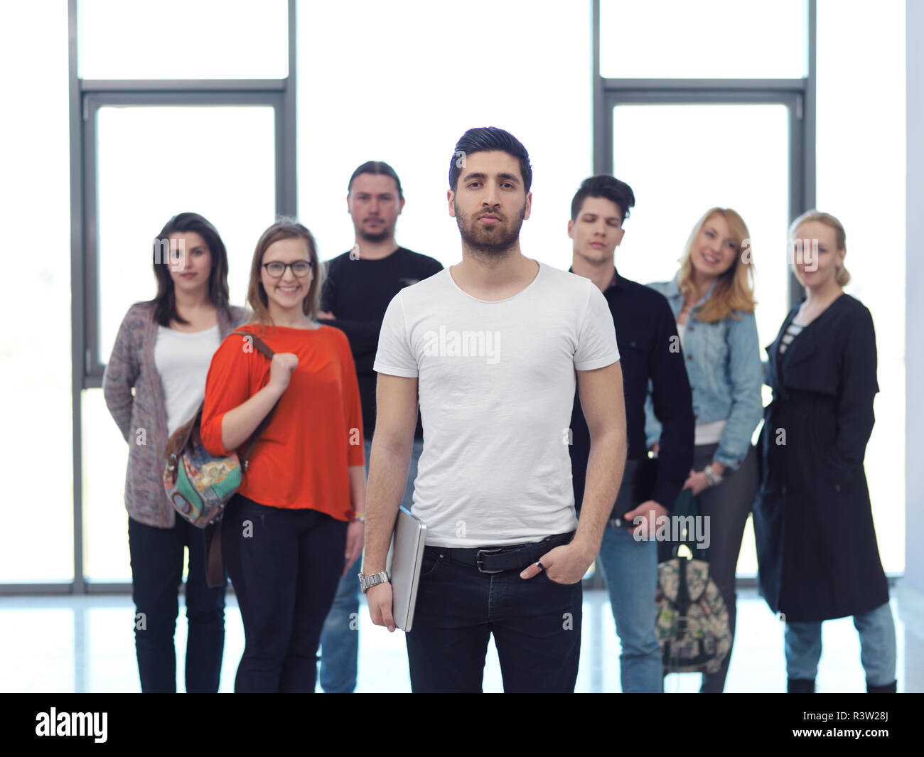 students group standing together as team Stock Photo - Alamy