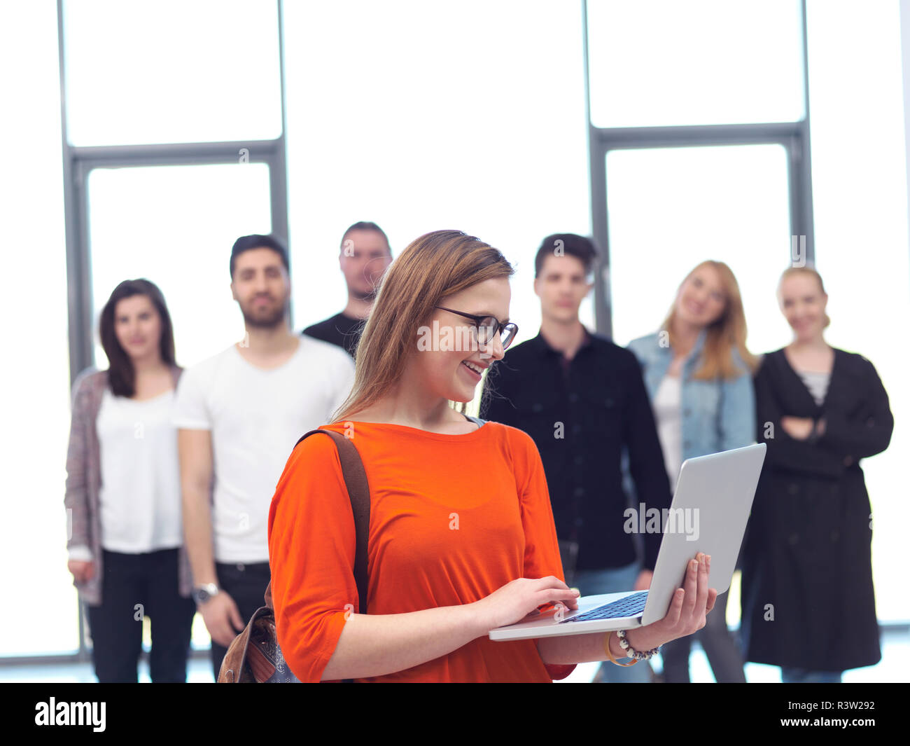 students group standing together as team Stock Photo - Alamy