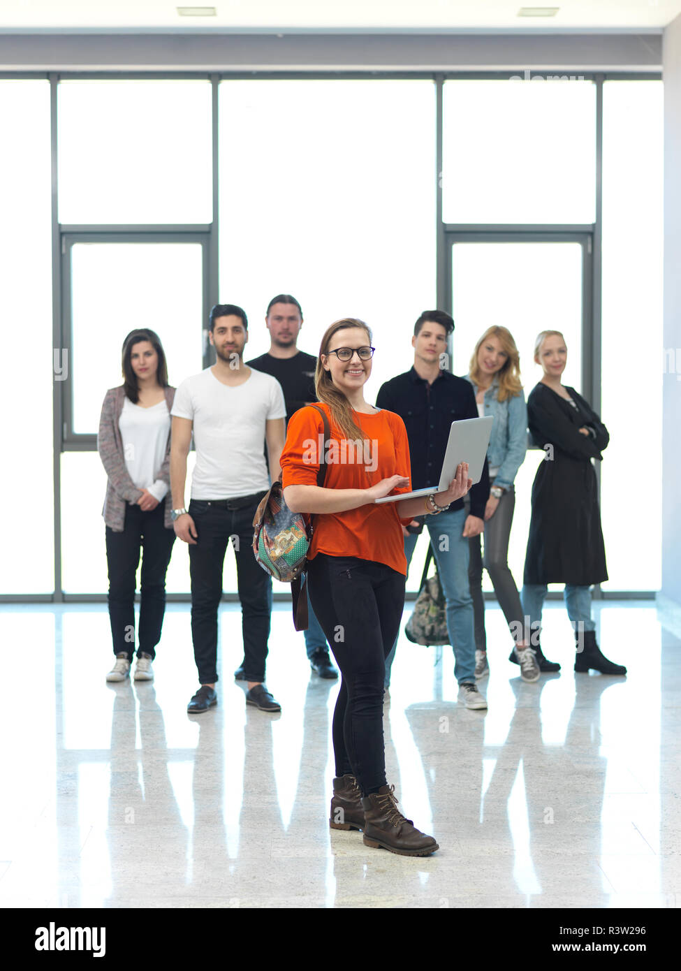 students group standing together as team Stock Photo - Alamy