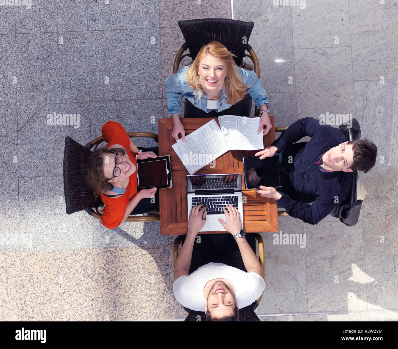 students group working on school project together Stock Photo - Alamy