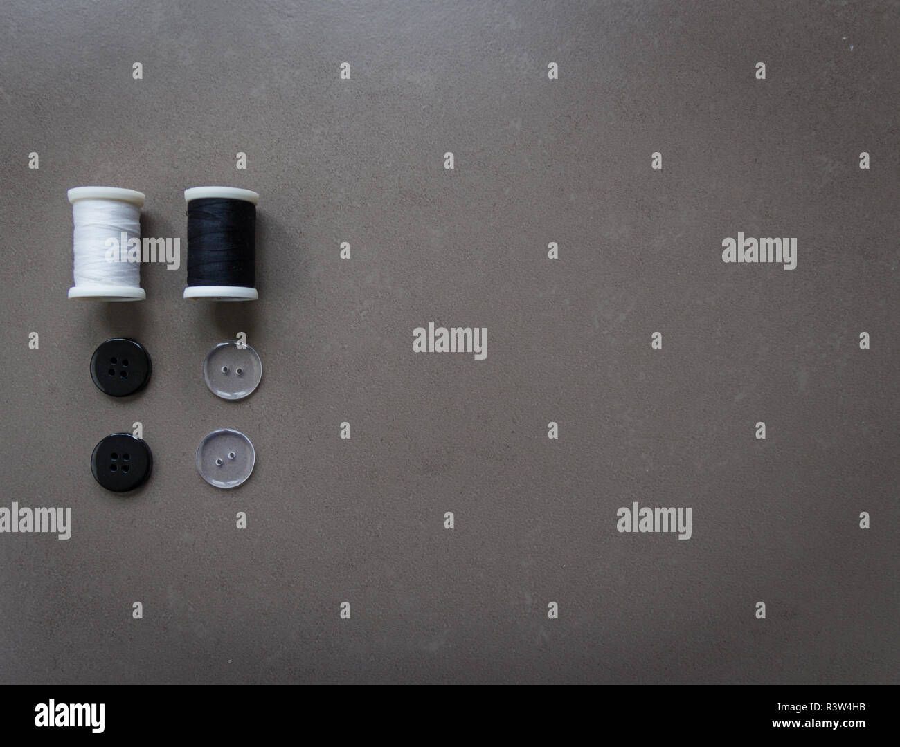 sewing thread and buttons Stock Photo - Alamy