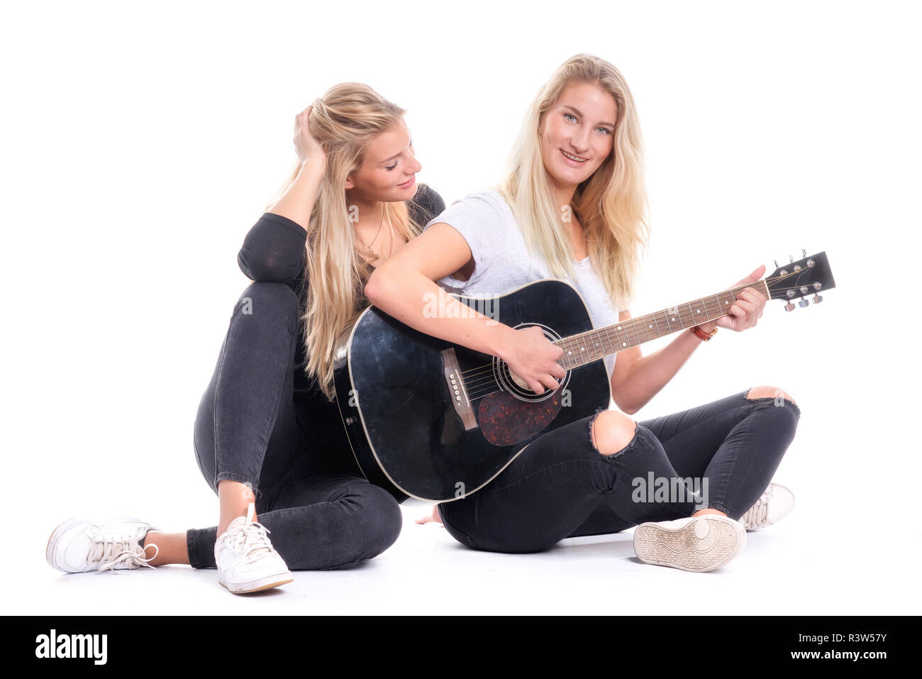 Two girls playing musical instruments Cut Out Stock Images & Pictures ...