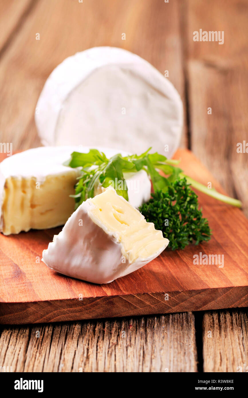 White rind cheese Stock Photo - Alamy