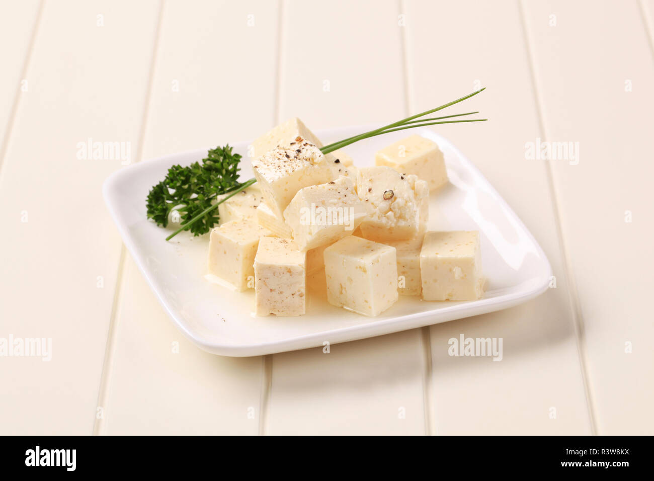 Diced feta cheese Stock Photo - Alamy