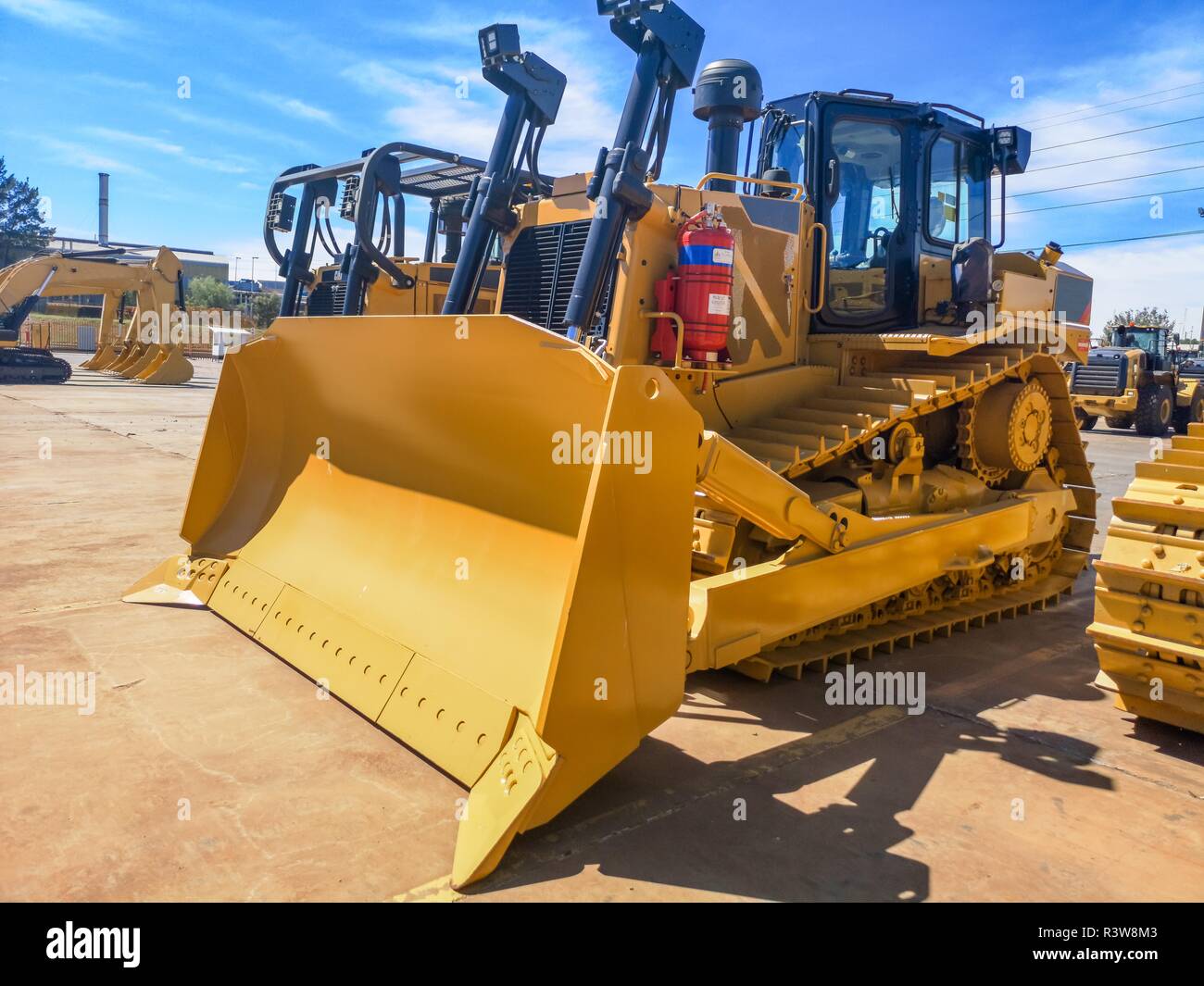 Brand new yellow bulldozer Stock Photo - Alamy