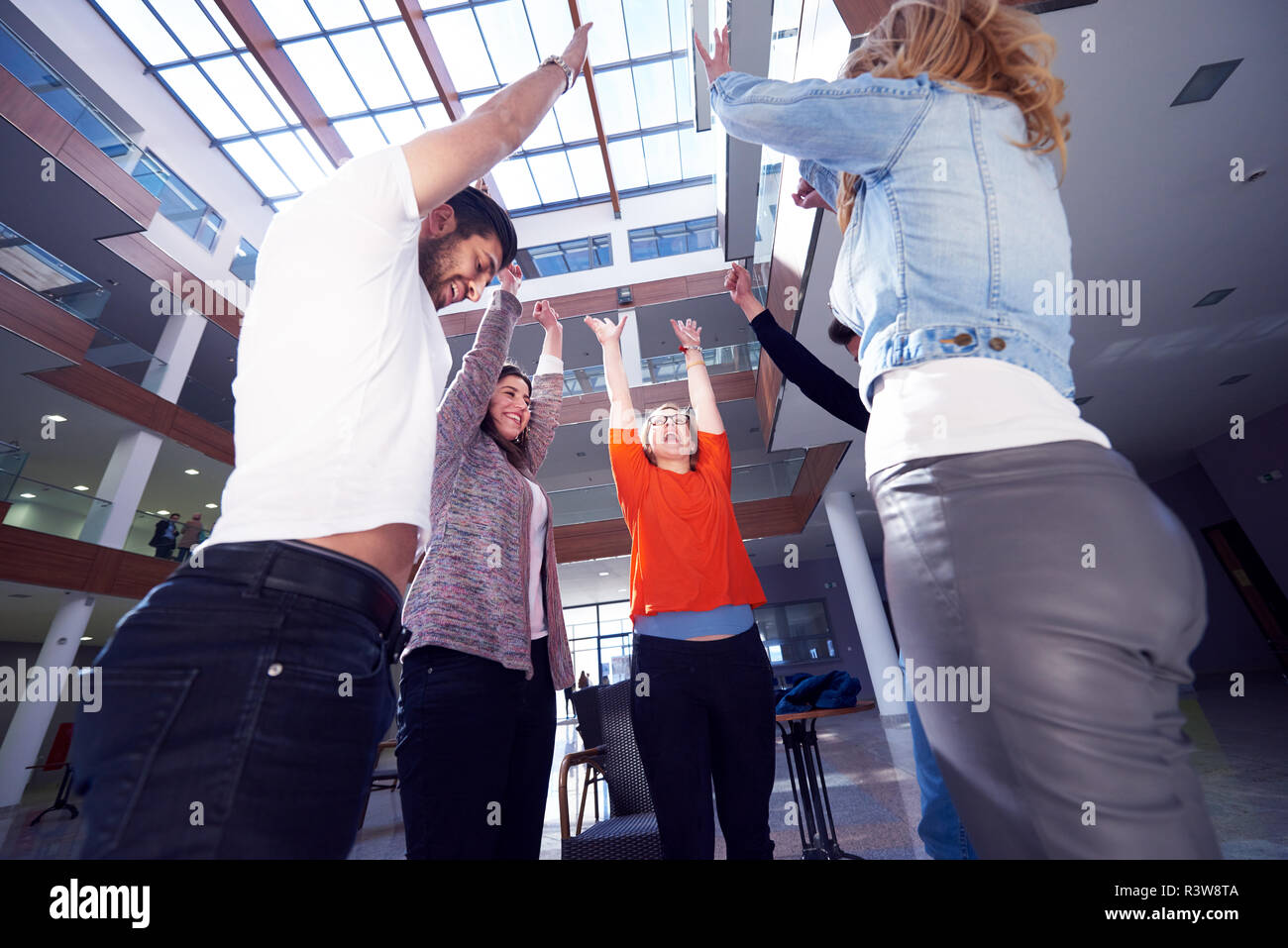 happy students celebrate Stock Photo - Alamy