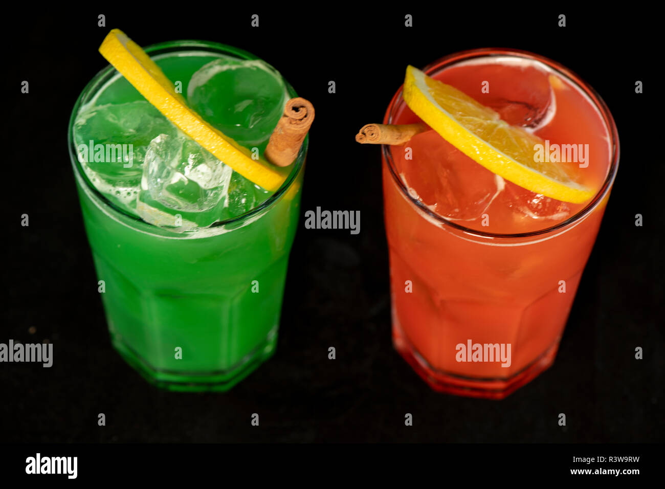 Red and Green Cocktails with red and green juices, alcohol and lime ...