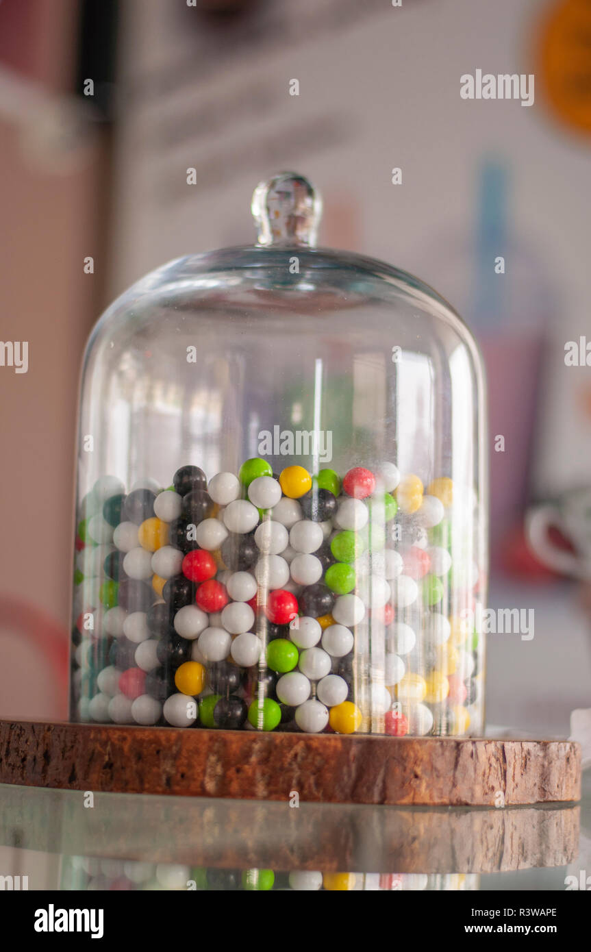 Colorful mix sweets in glass jar Stock Photo - Alamy