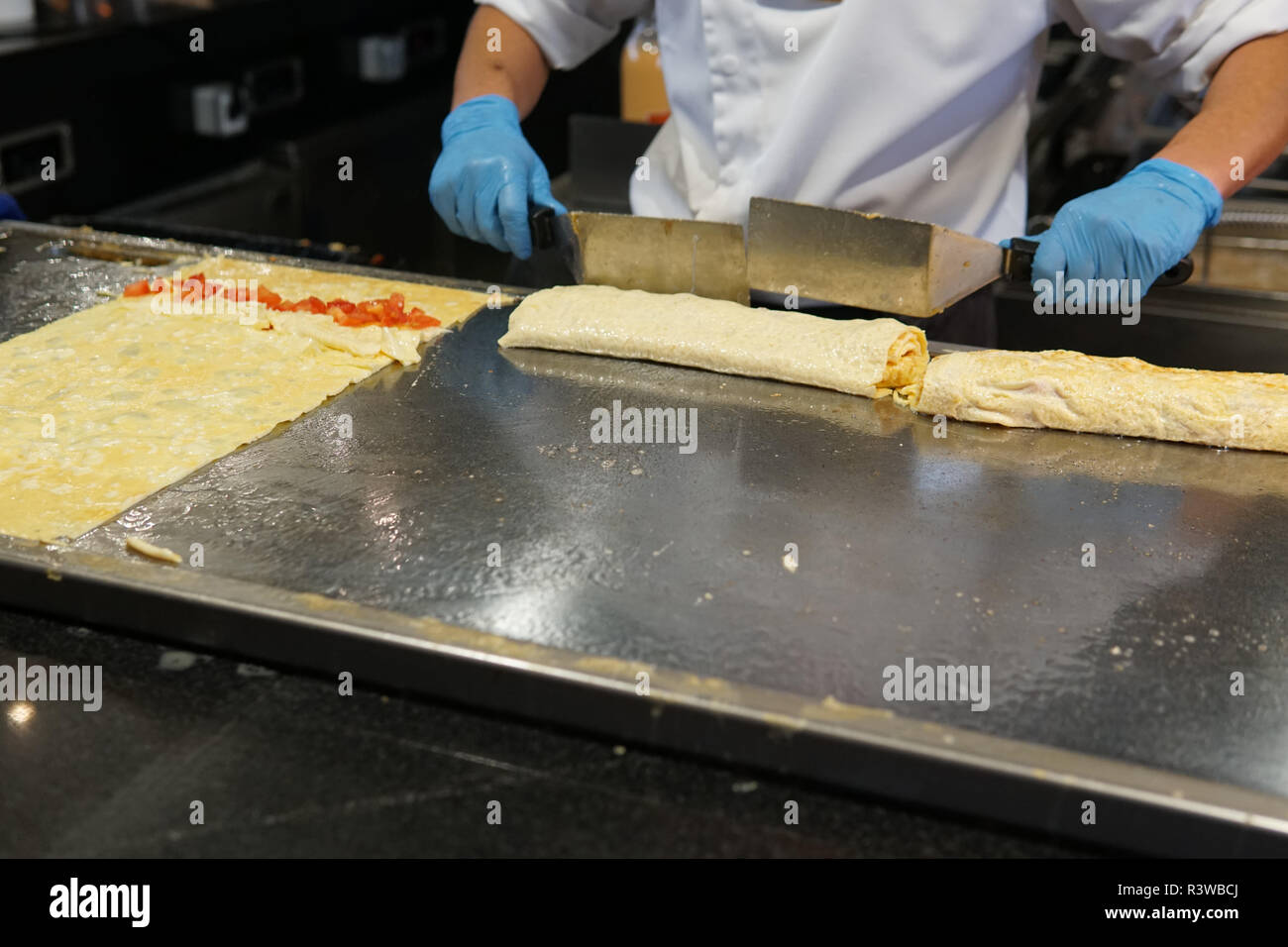 Woman prepares eggs food hi-res stock photography and images - Alamy