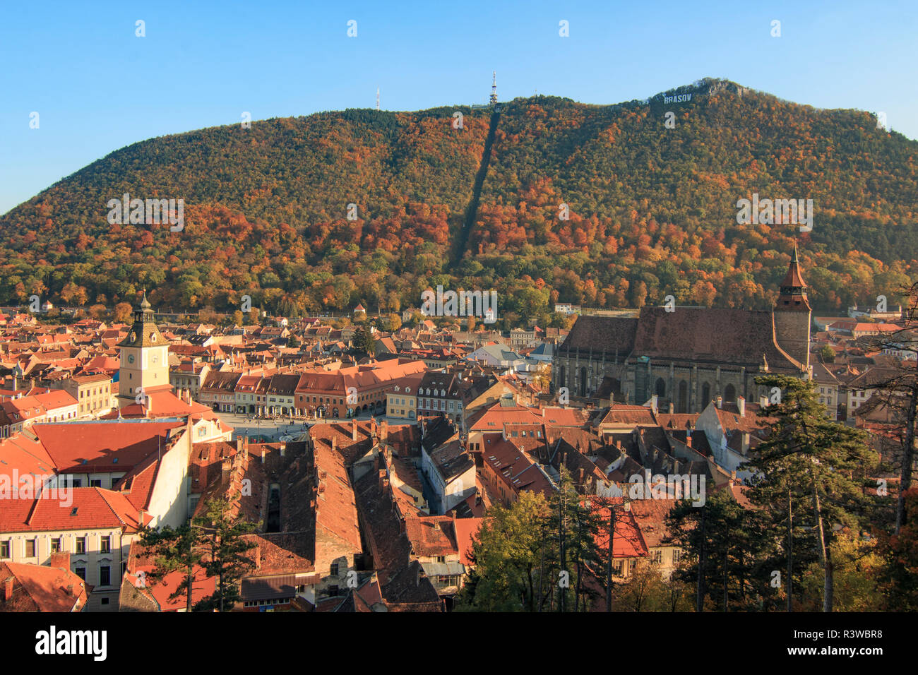 Romania, Brasov. City signage. Poarta Schei district. Looking out over ...