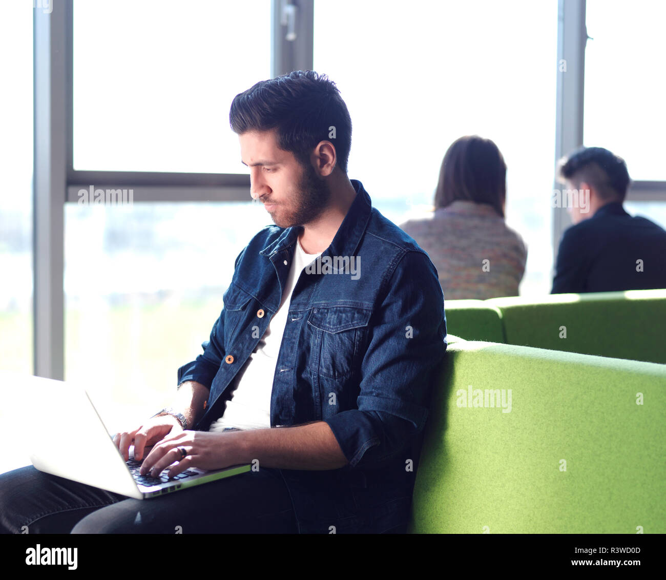 student working on laptop Stock Photo - Alamy
